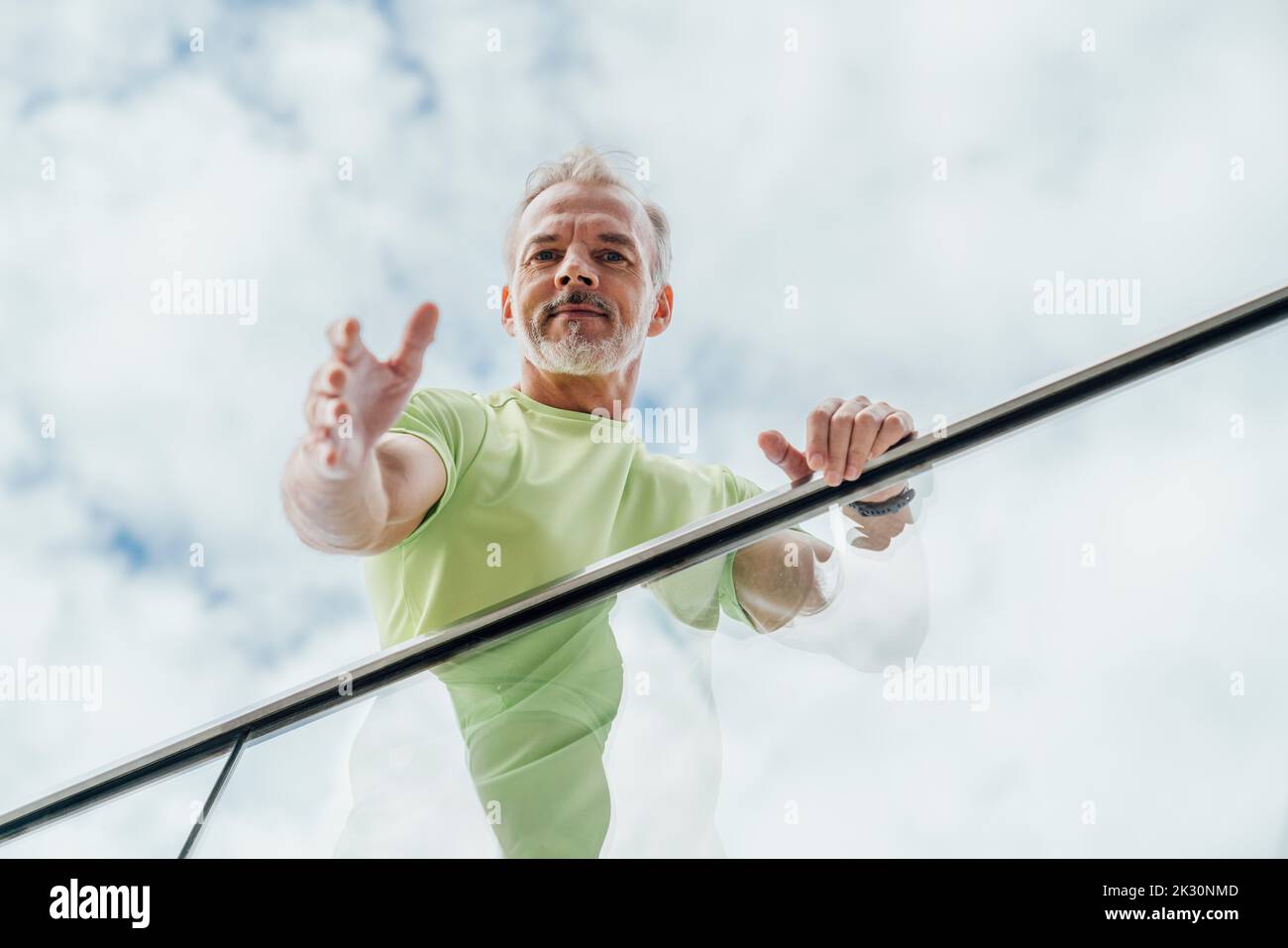 Hand reaching for railing hi-res stock photography and images - Alamy