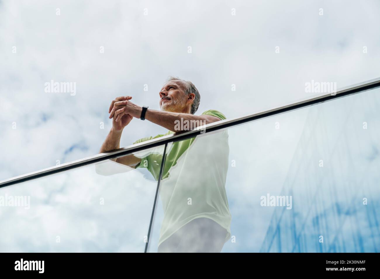 Male athlete leaning on railing hi-res stock photography and images - Alamy