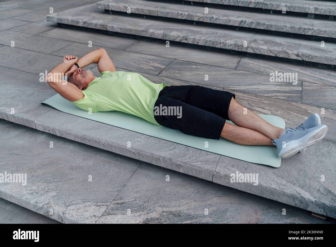 Man resting steps stairs hi-res stock photography and images - Alamy