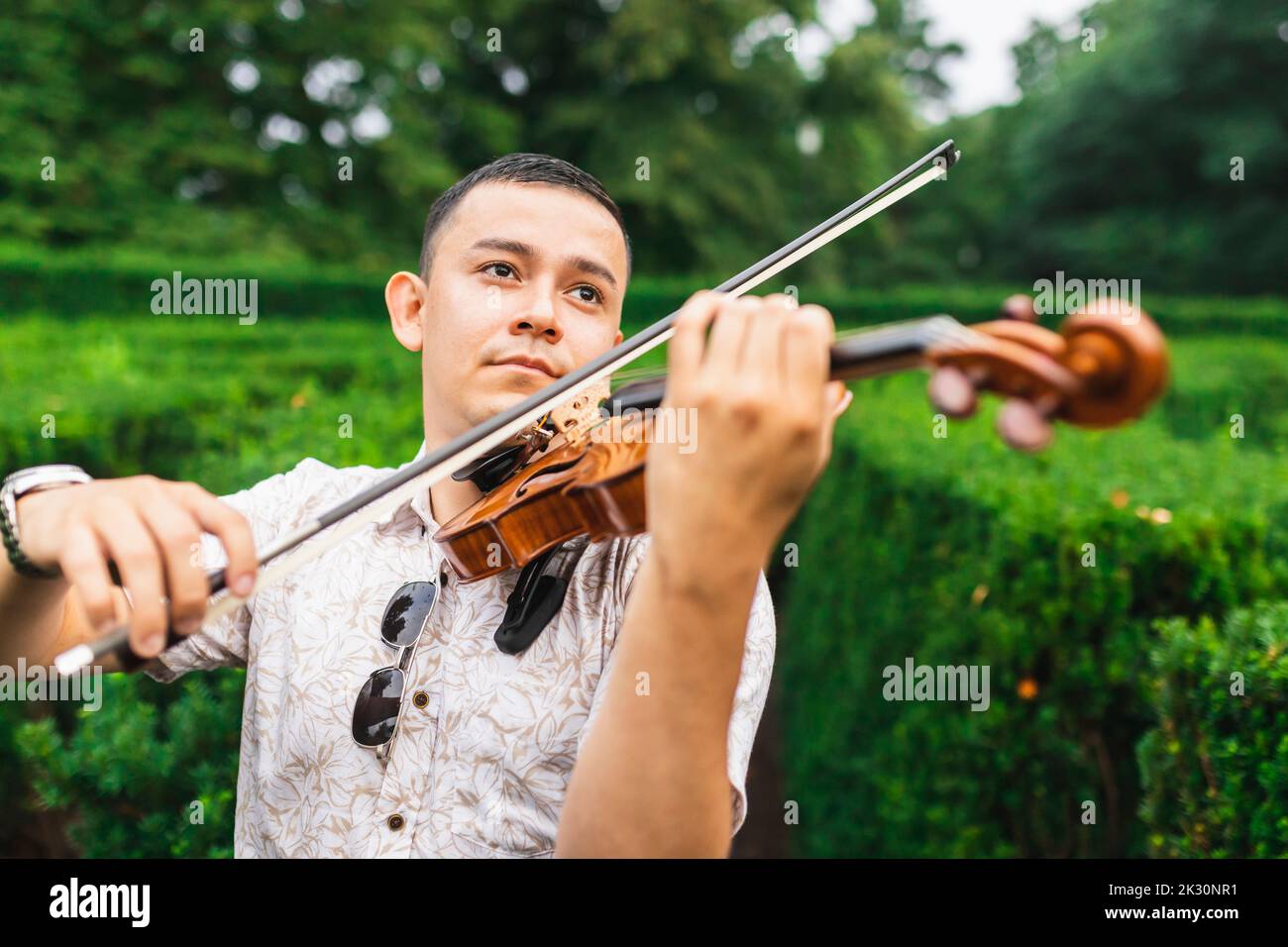 Latin american man playing hi-res stock photography and images - Alamy