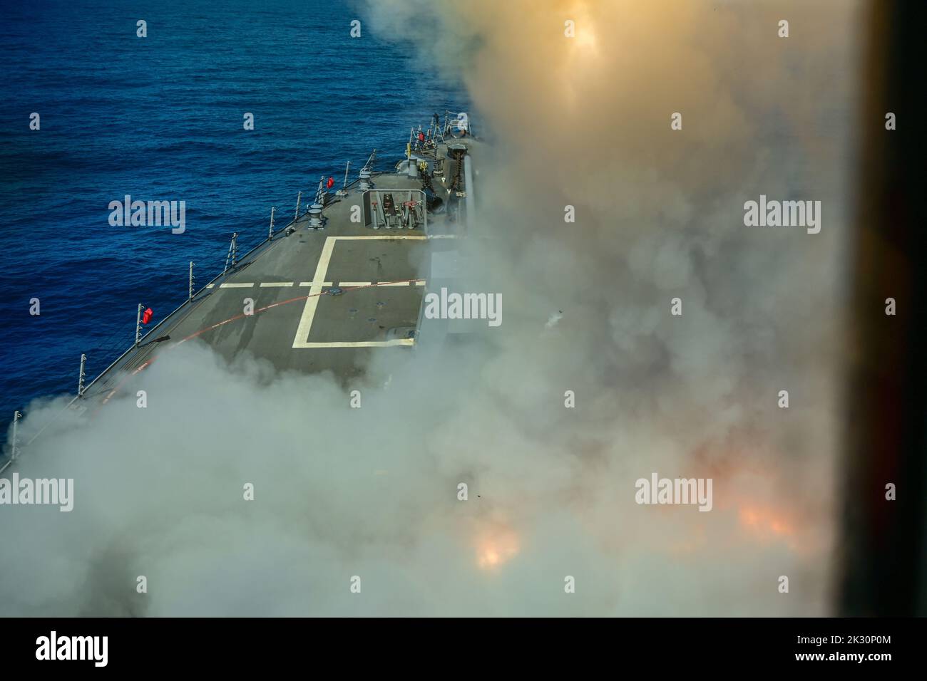 An SM-2 Block IIIA missile launches from a vertical launching system of ...
