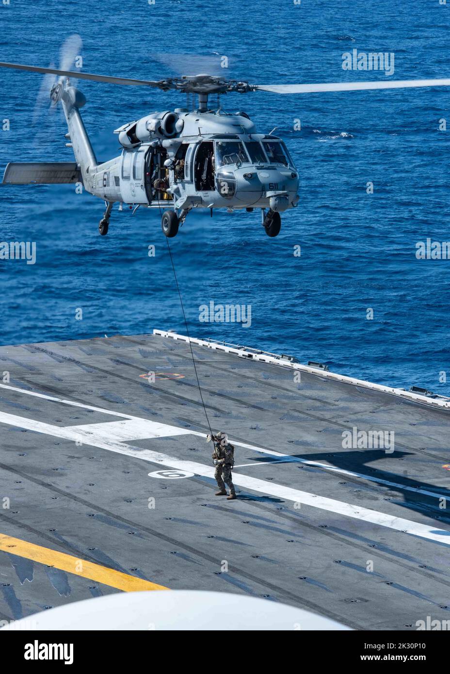 220921-N-UF592-1060 PHILIPPINE SEA (Sept. 21, 2022) A member of ...