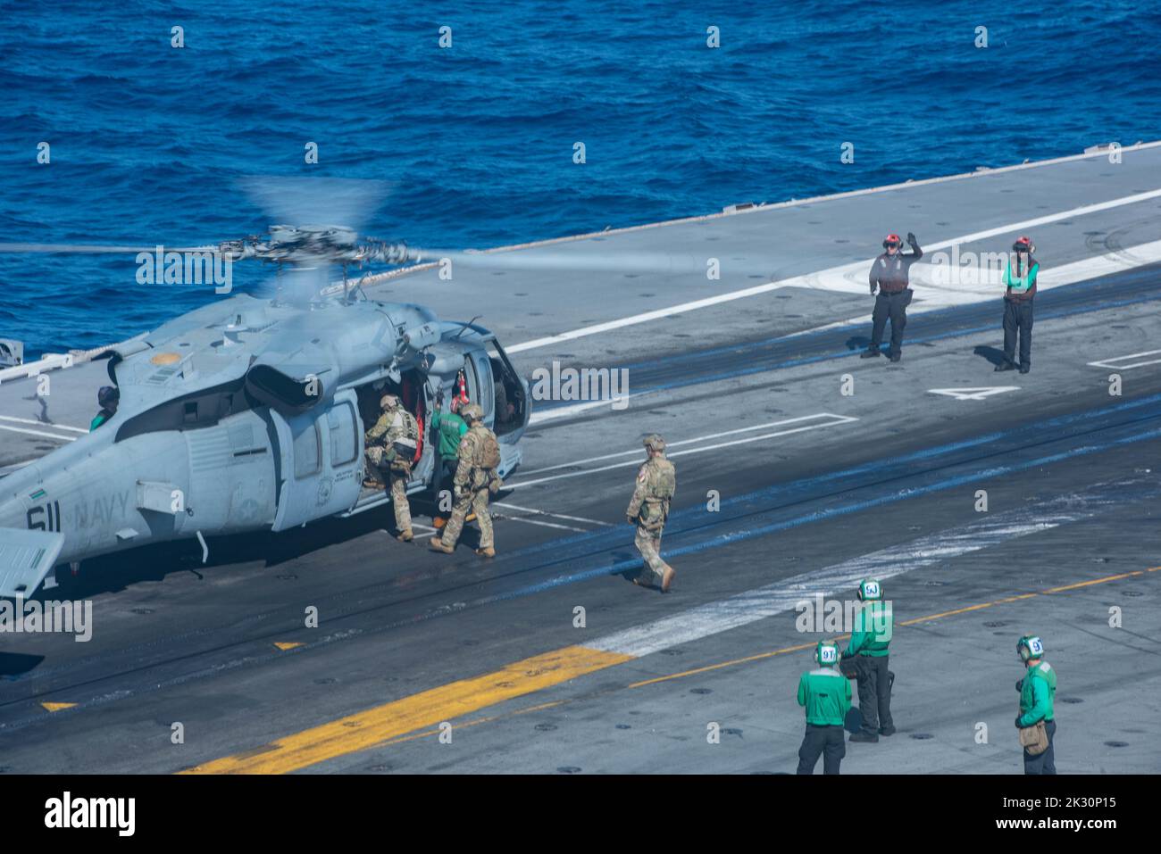 220921-N-UF592-1027 PHILIPPINE SEA (Sept. 21, 2022) Members of ...