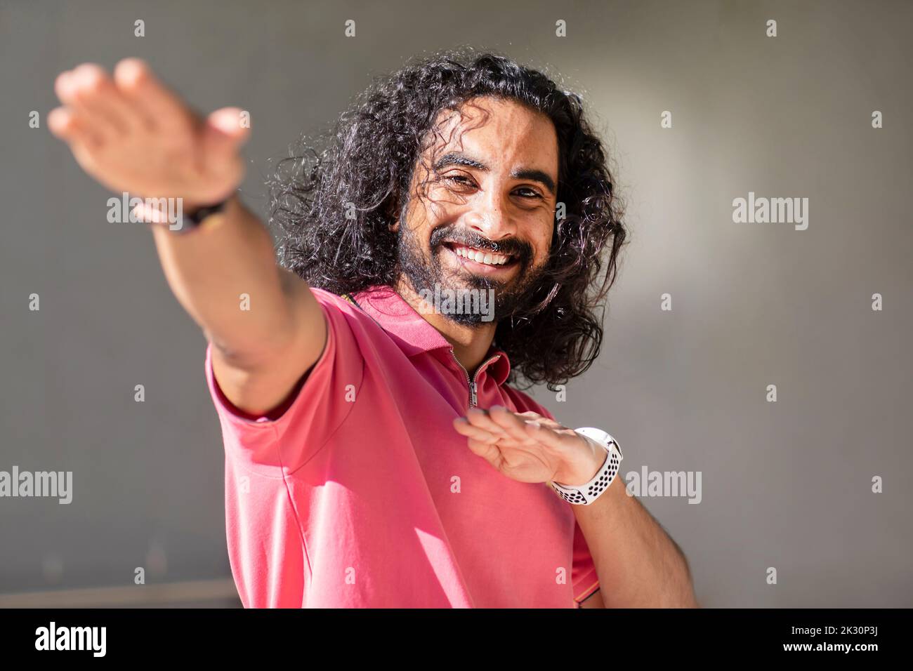Bearded man raised hand hi-res stock photography and images - Alamy