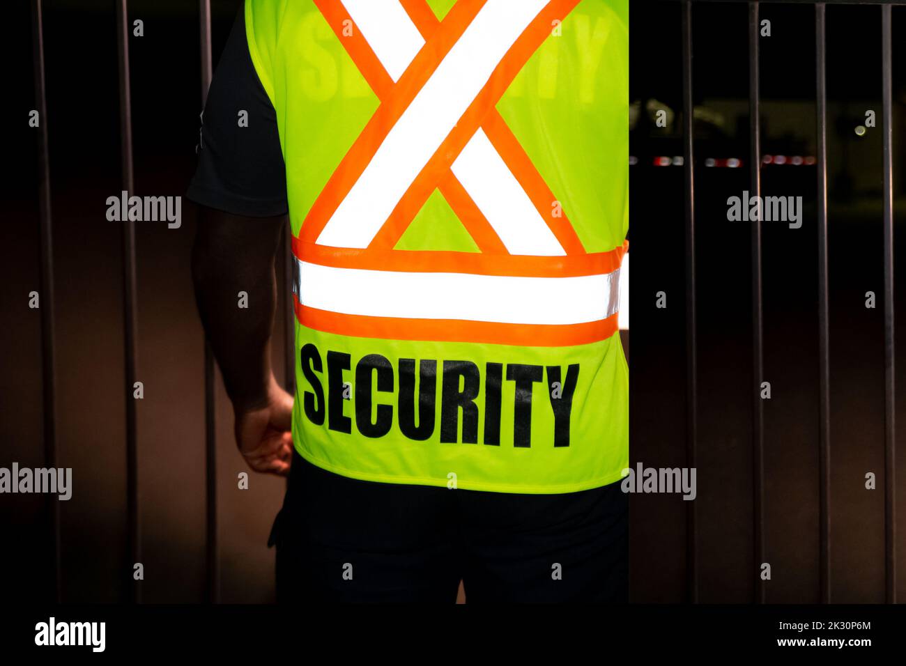 Security guard patrolling soccer stadium Stock Photo - Alamy