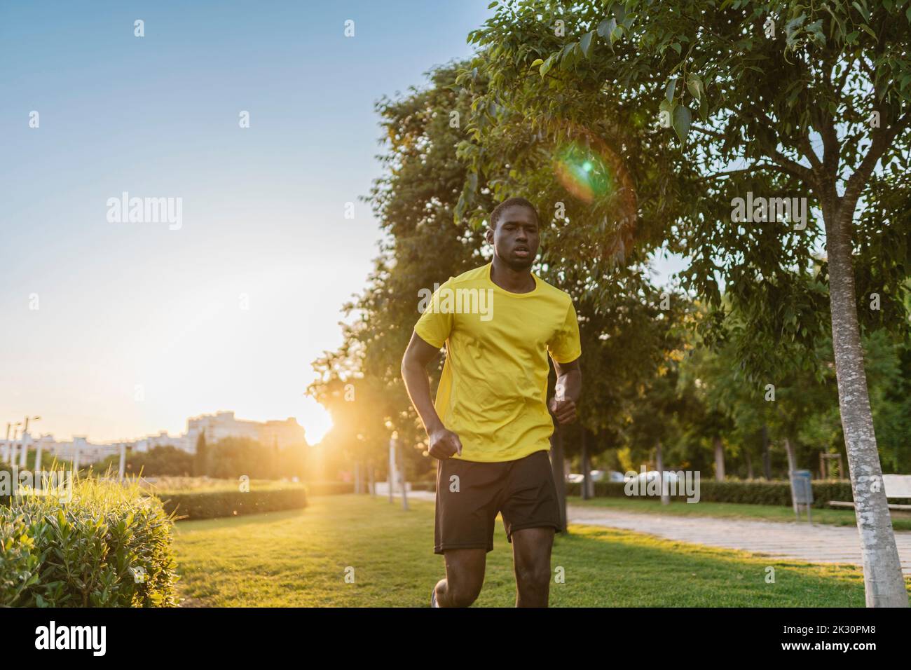Man running park hi-res stock photography and images - Alamy
