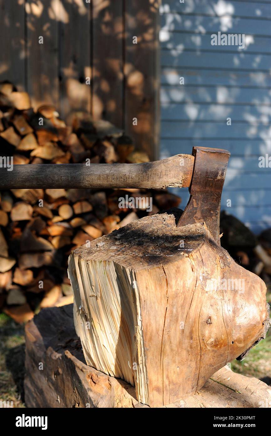 Axe in the stump hi-res stock photography and images - Alamy