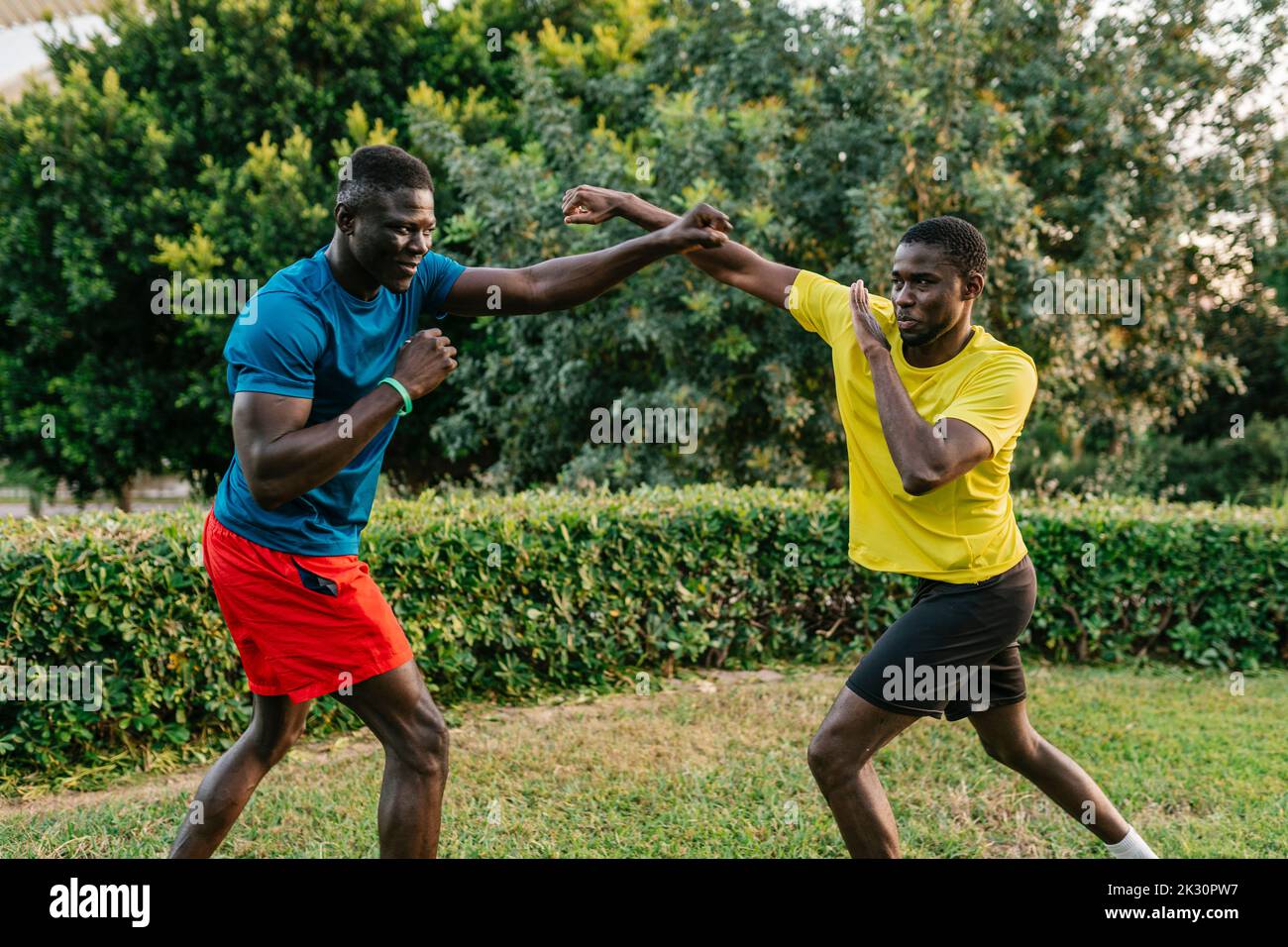 Young men fighting hi-res stock photography and images - Alamy