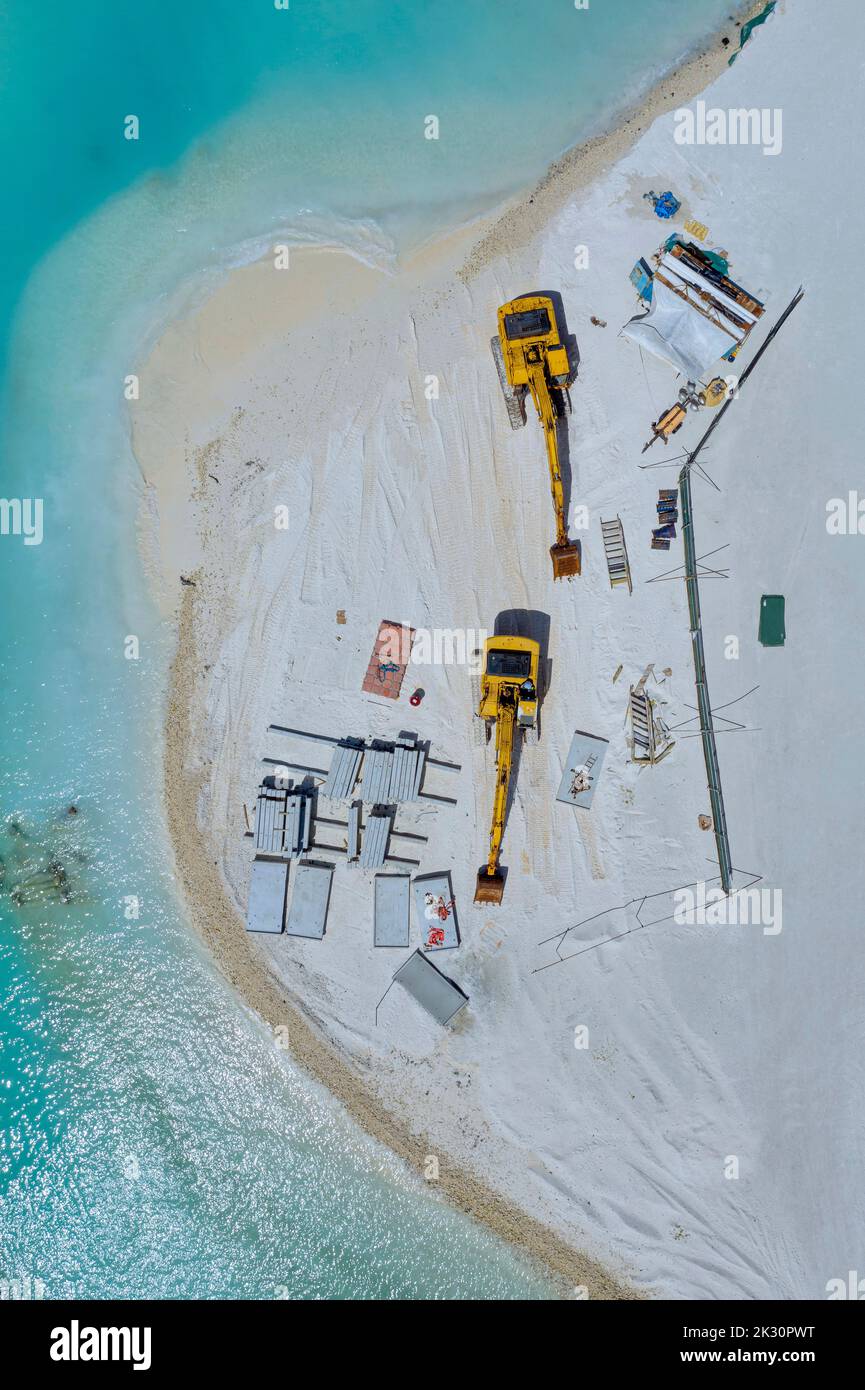Maldives, Aerial view of construction site at edge of sandy beach Stock ...