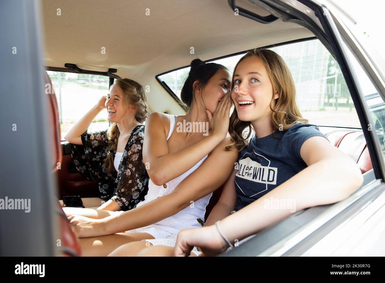 Teen girl in car backseat hi-res stock photography and images - Alamy