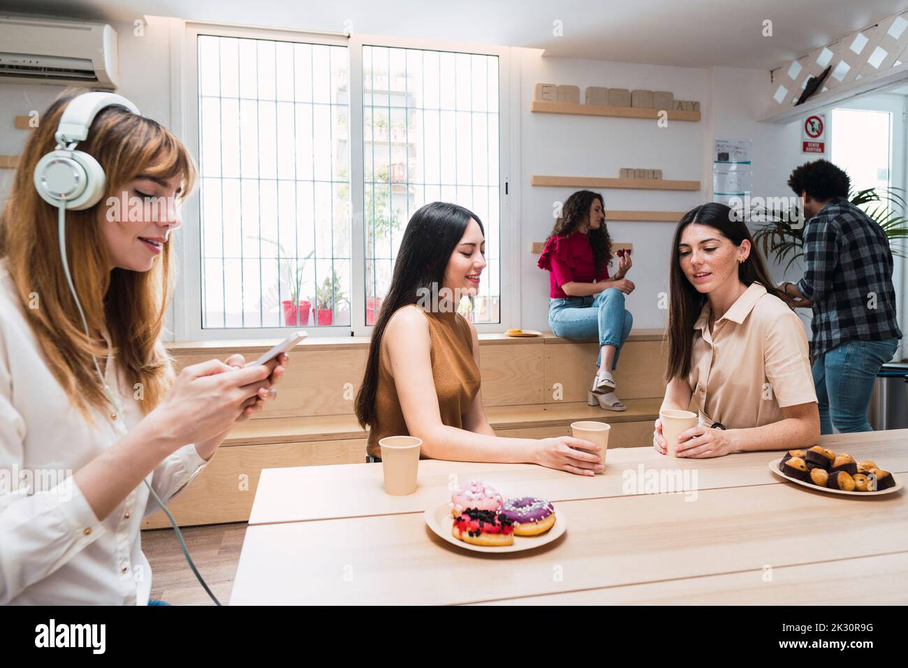 Business colleague taking break in office cafeteria Stock Photo - Alamy