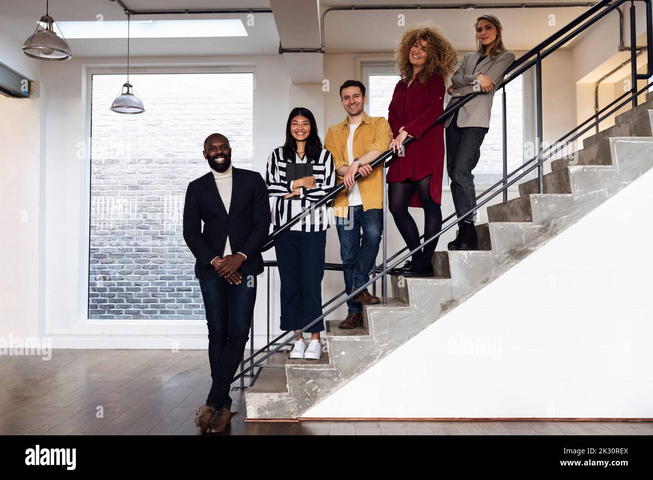 Group people on stairs hi-res stock photography and images - Alamy
