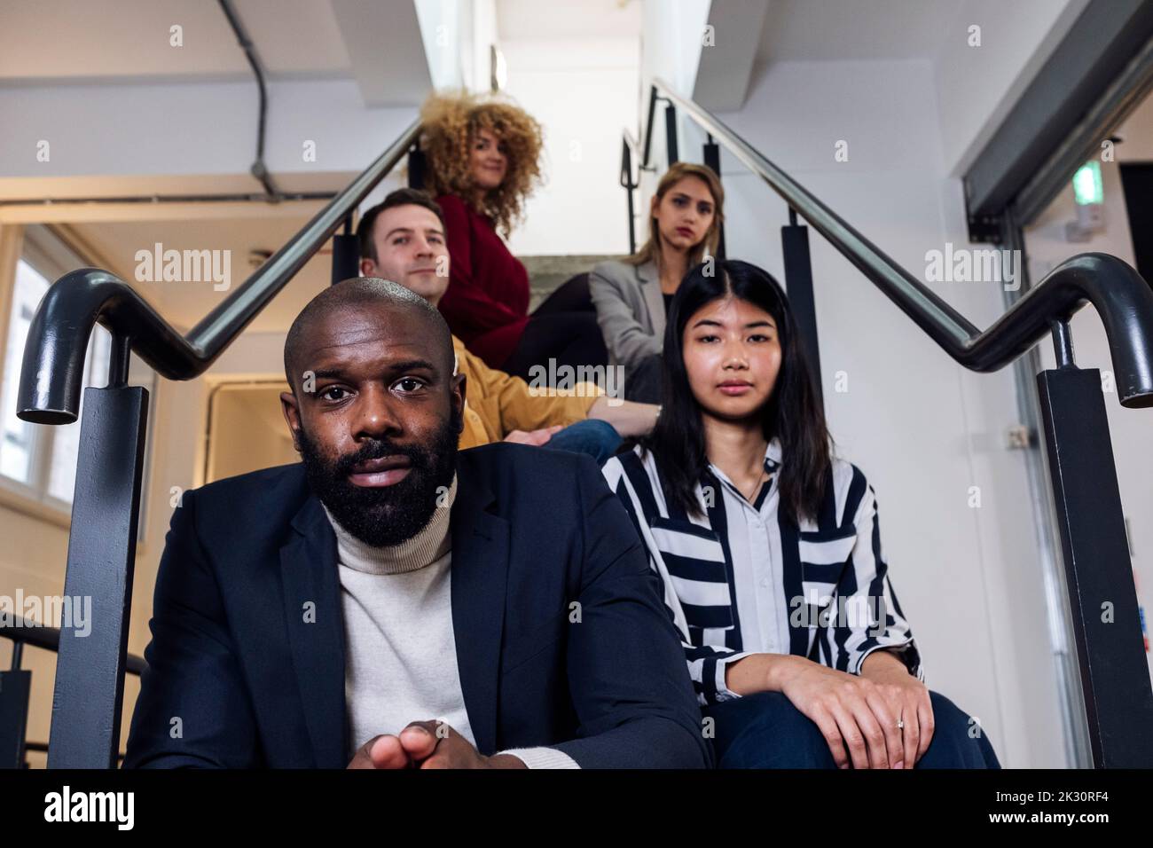 Group people on stairs hi-res stock photography and images - Alamy