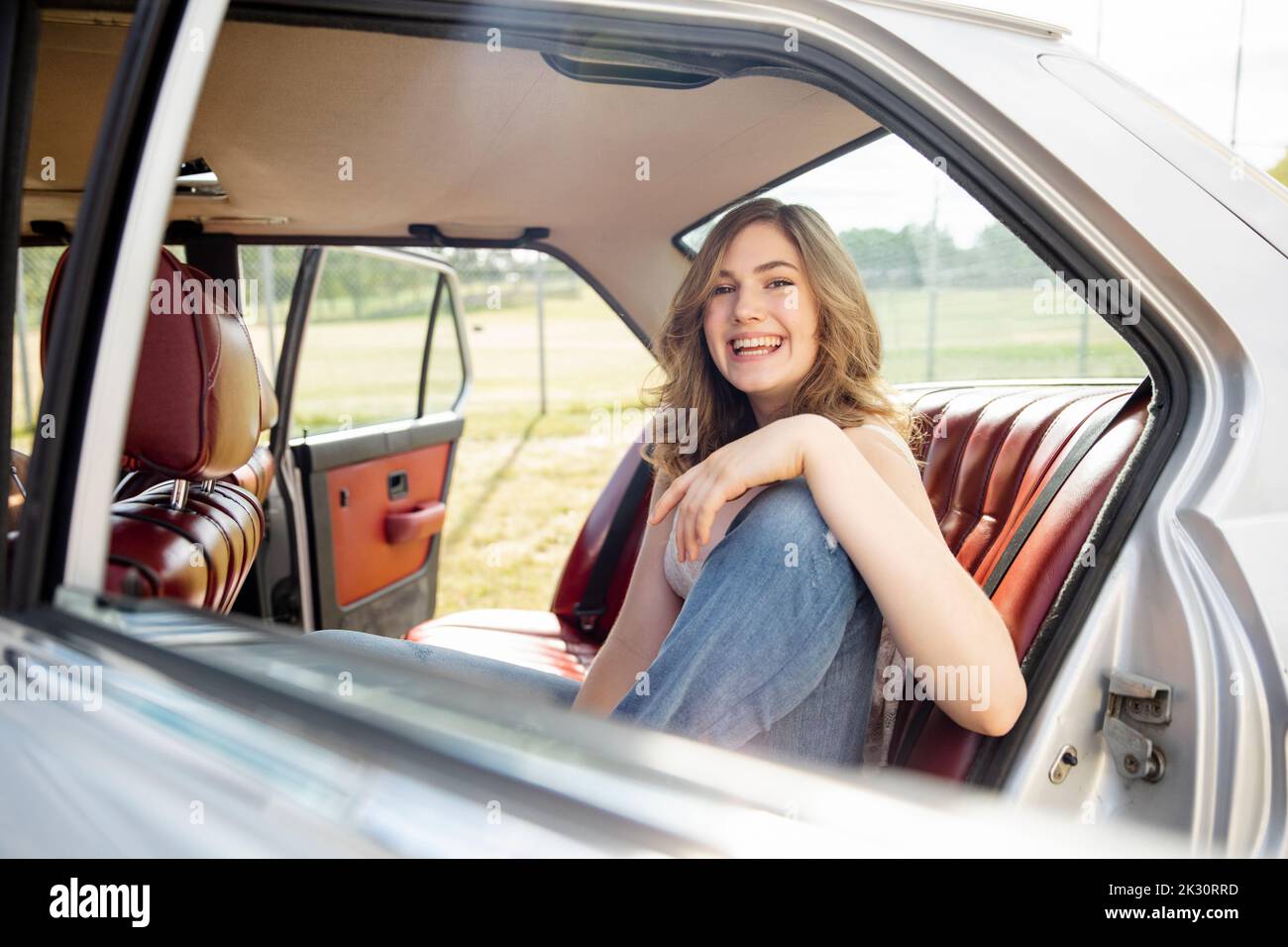 Teen girl in car backseat hi-res stock photography and images - Alamy