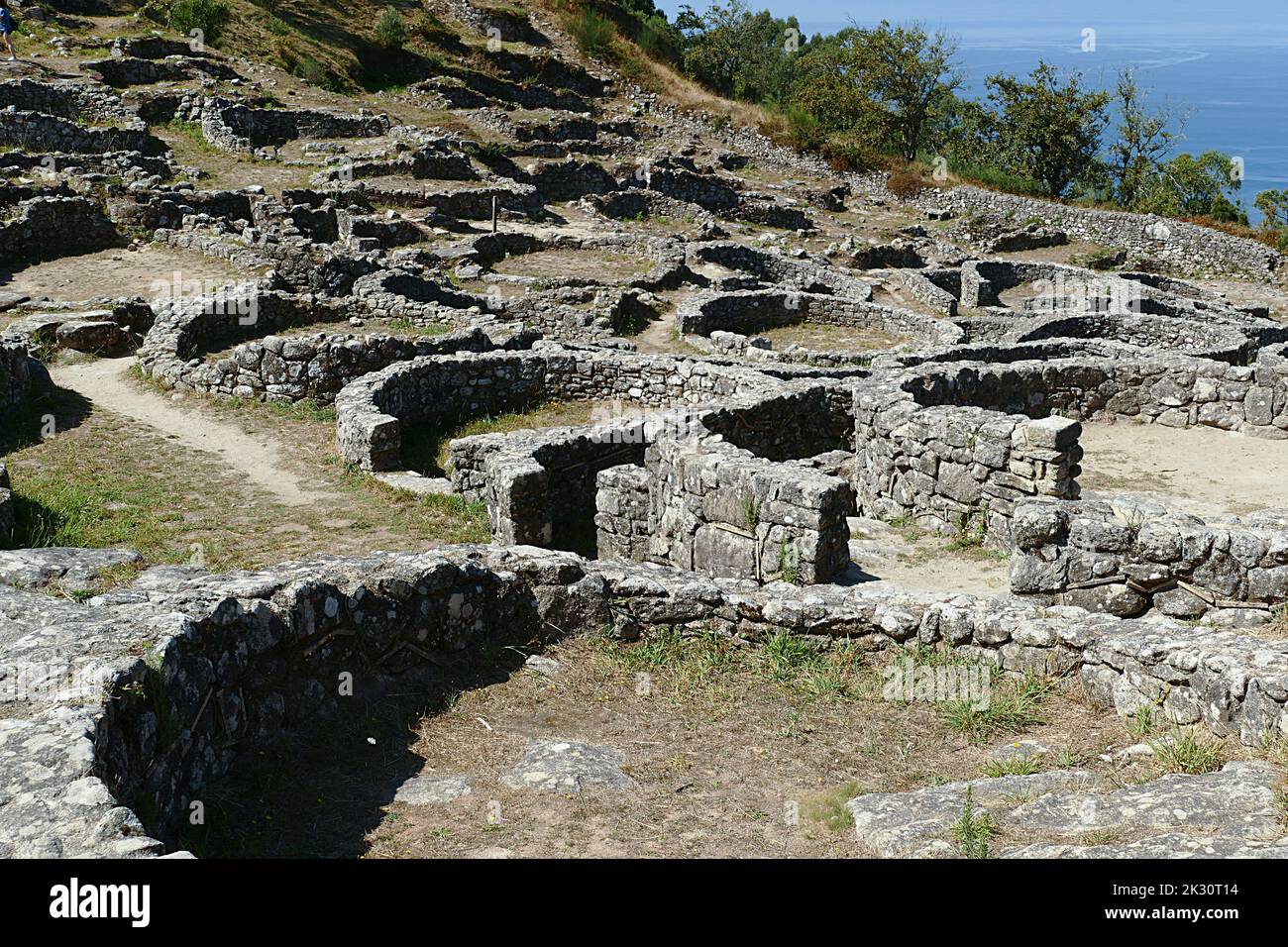 Ruins of ancient celtic settlement stone dwellings in Castro de Santa ...