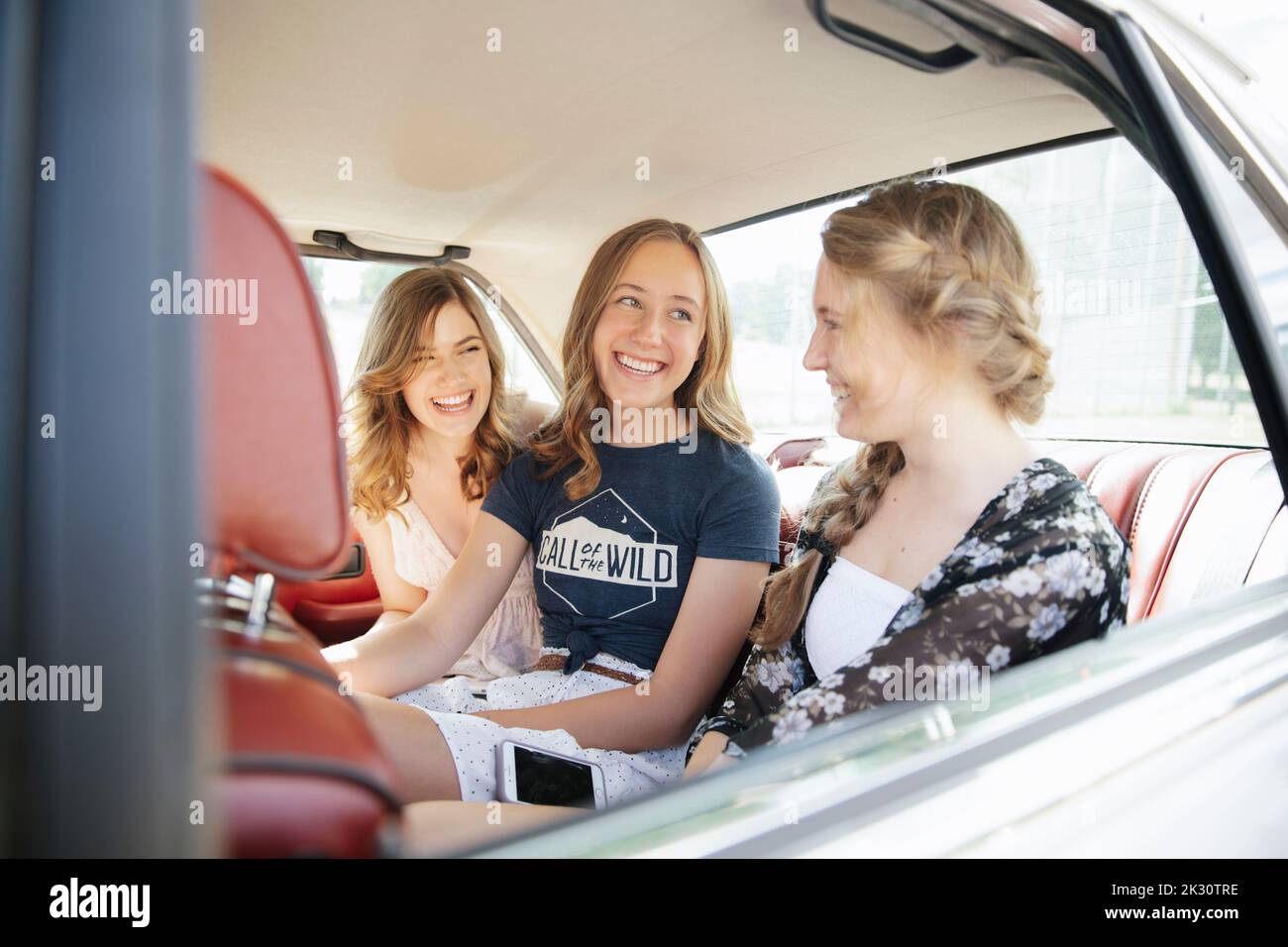 Teenager car back seat hi-res stock photography and images - Alamy
