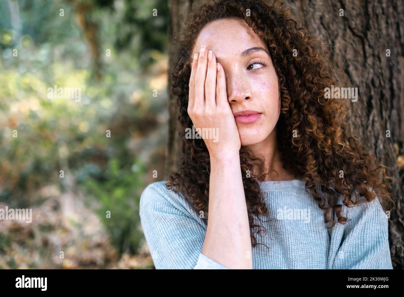 Woman face hand beauty hi-res stock photography and images - Alamy