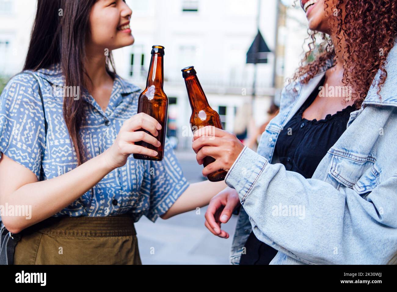 Happy mixed ethnicity friends socializing hi-res stock photography and ...