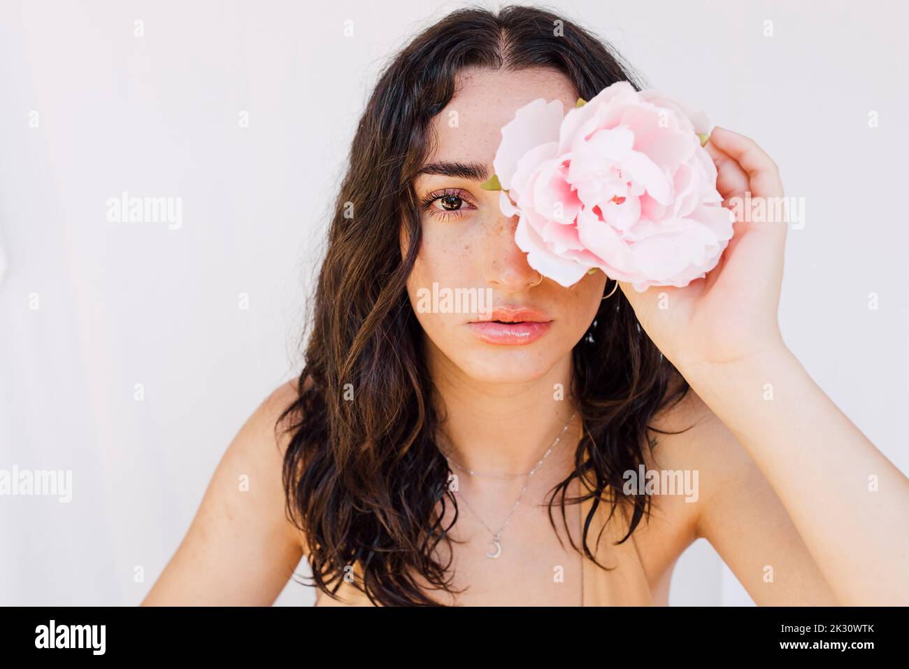 Women hair beauty long over one eye hi-res stock photography and images ...