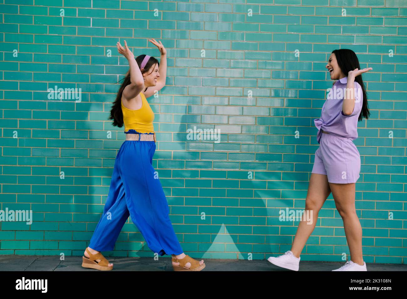 Two People Walking Towards Each Other