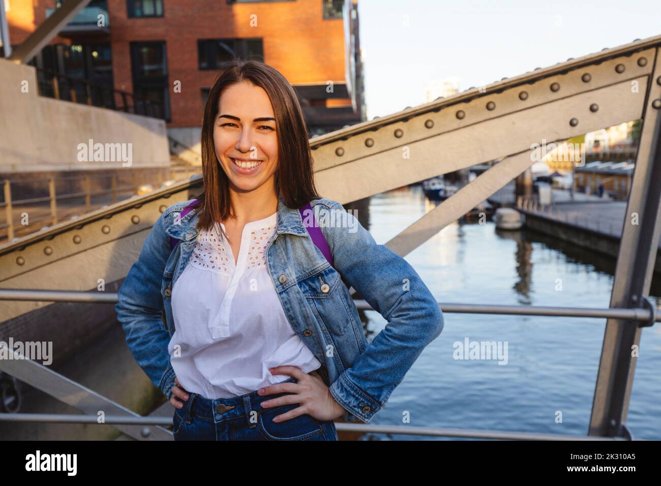 Woman looking over bridge hi-res stock photography and images - Alamy