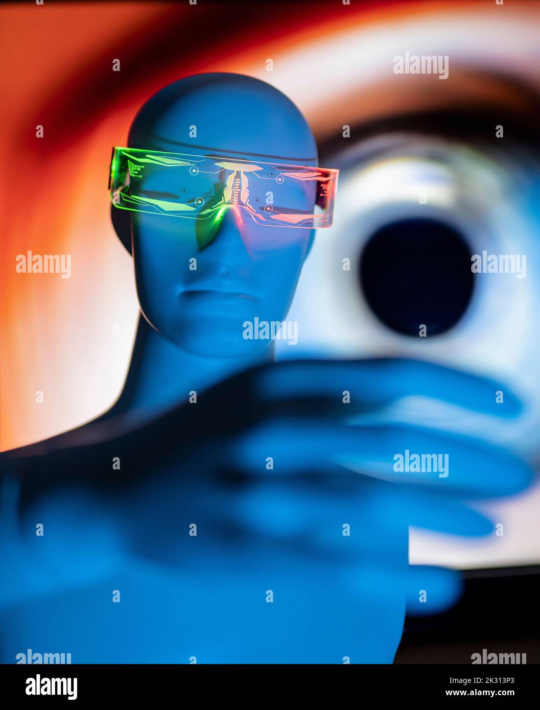 Robot with glowing futuristic smart eyeglasses in front of eye Stock ...