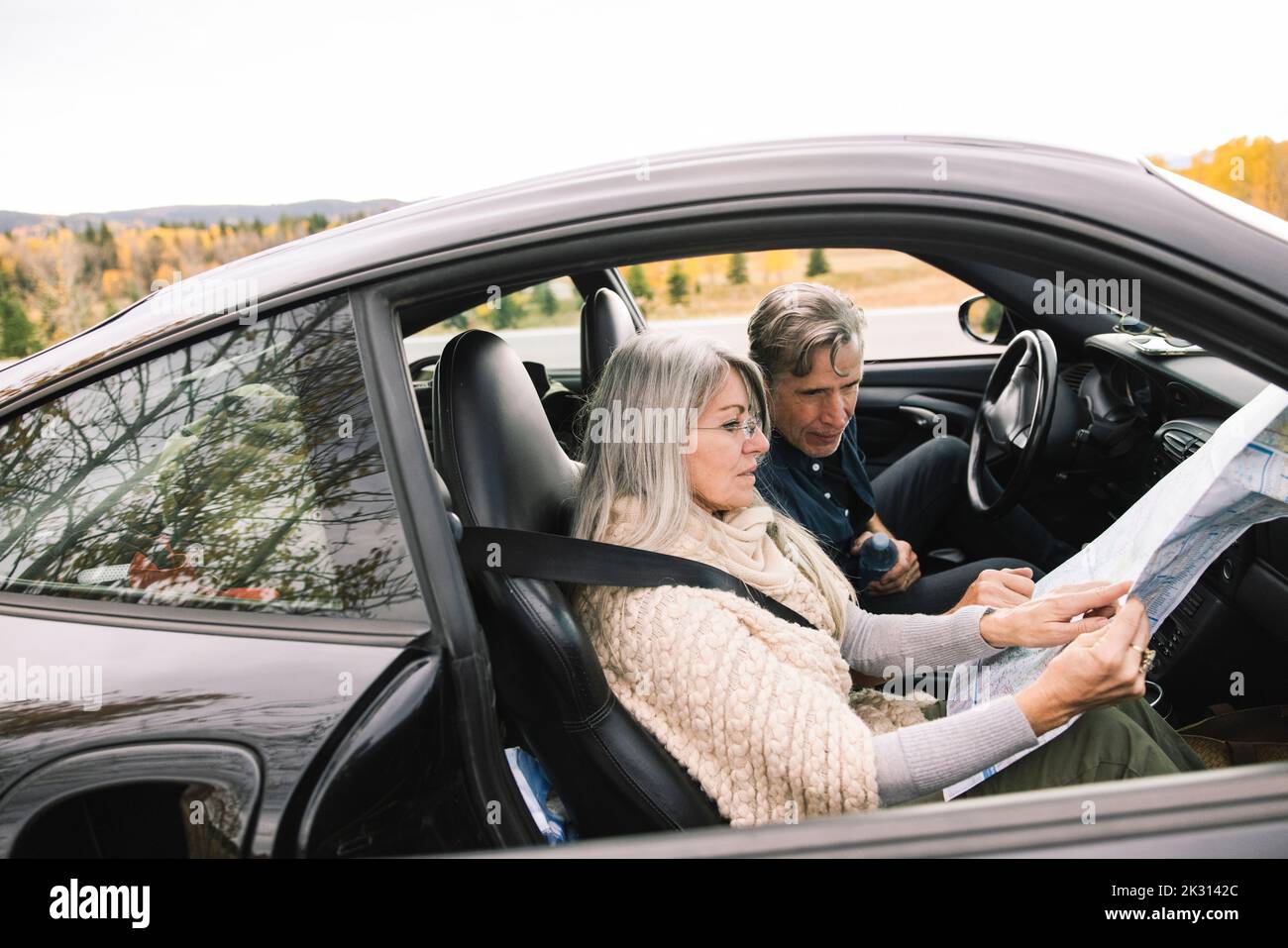 Map in car hi-res stock photography and images - Alamy