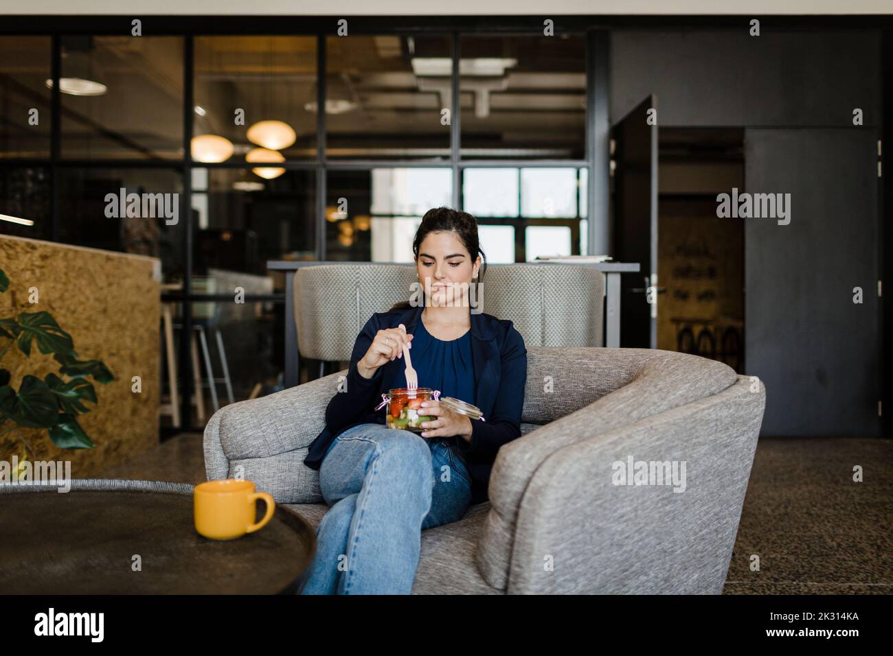 Business person eating healthy snack hi-res stock photography and ...