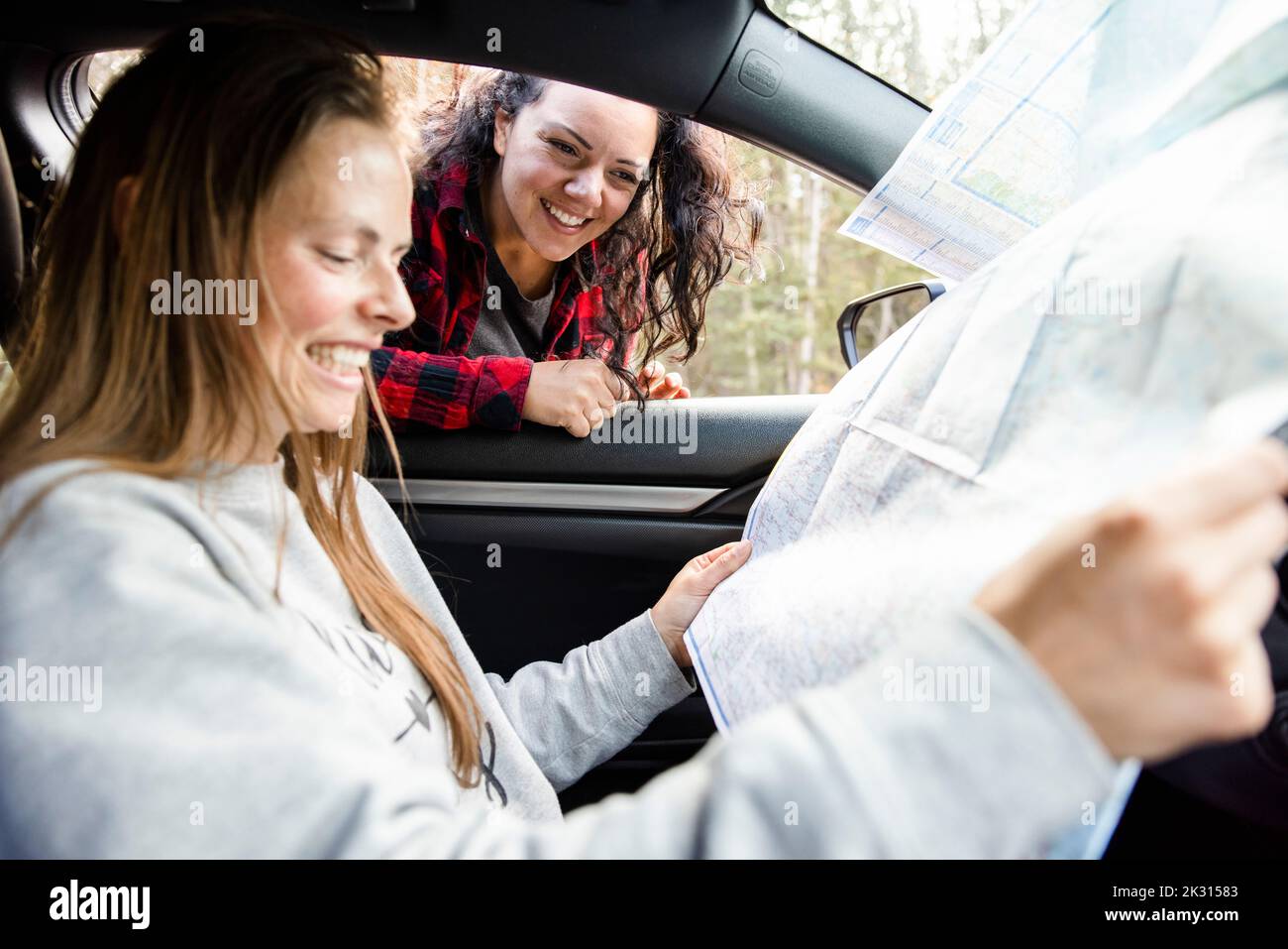 Map in car hi-res stock photography and images - Alamy