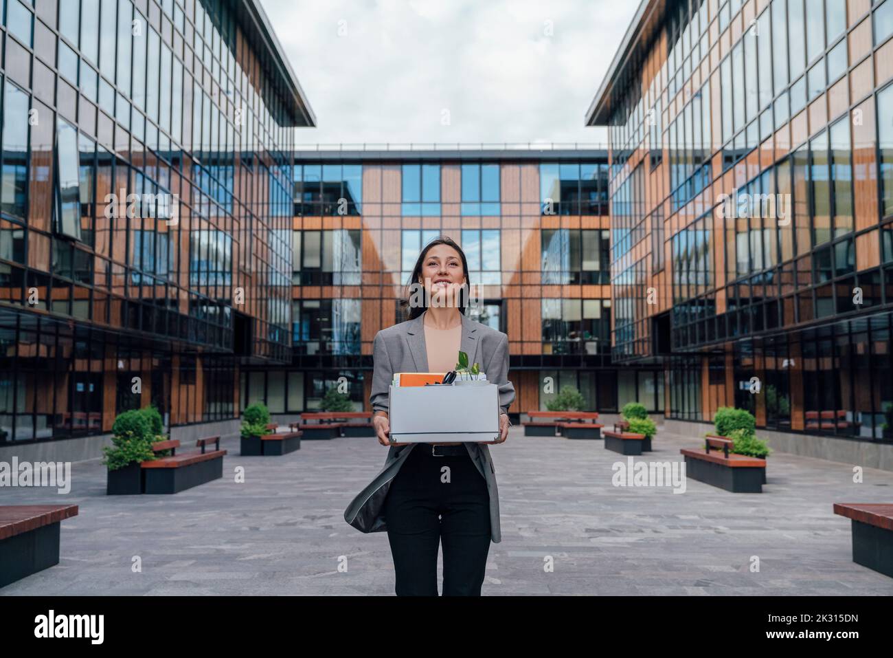 Person carrying box walking hi-res stock photography and images - Alamy