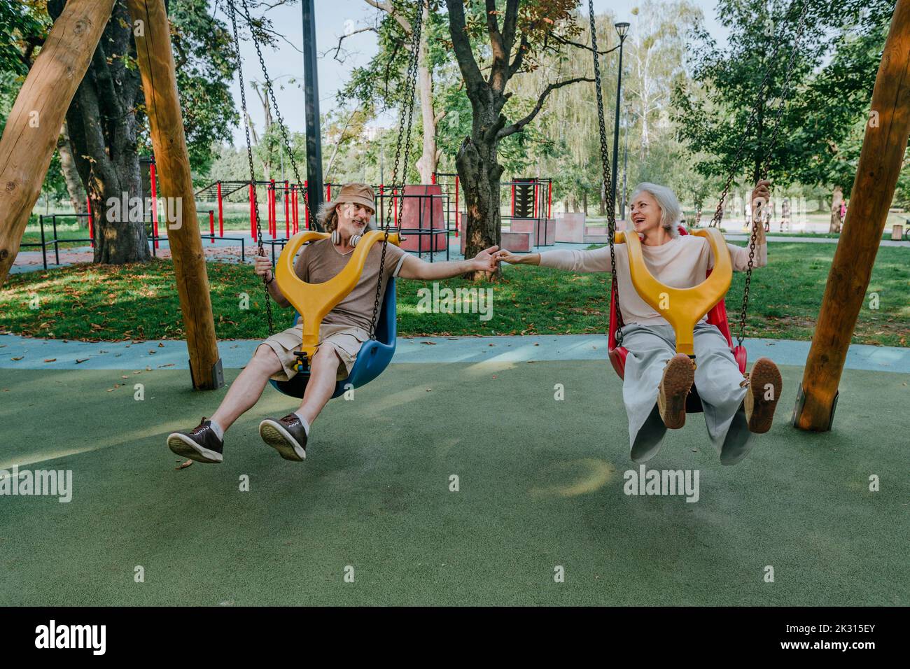 Mature couple swinging hi-res stock photography and images - Alamy