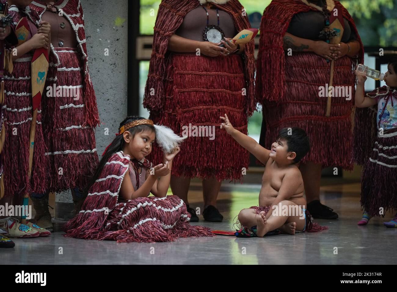 Canada. 23rd Sep, 2022. Children sit and listen after members of the ...