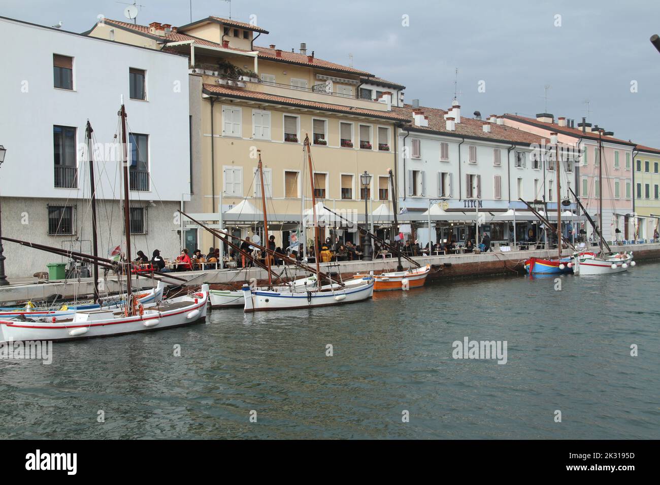 Cesenatico, Italy. Fishing boats docked on the canal and an animated ...