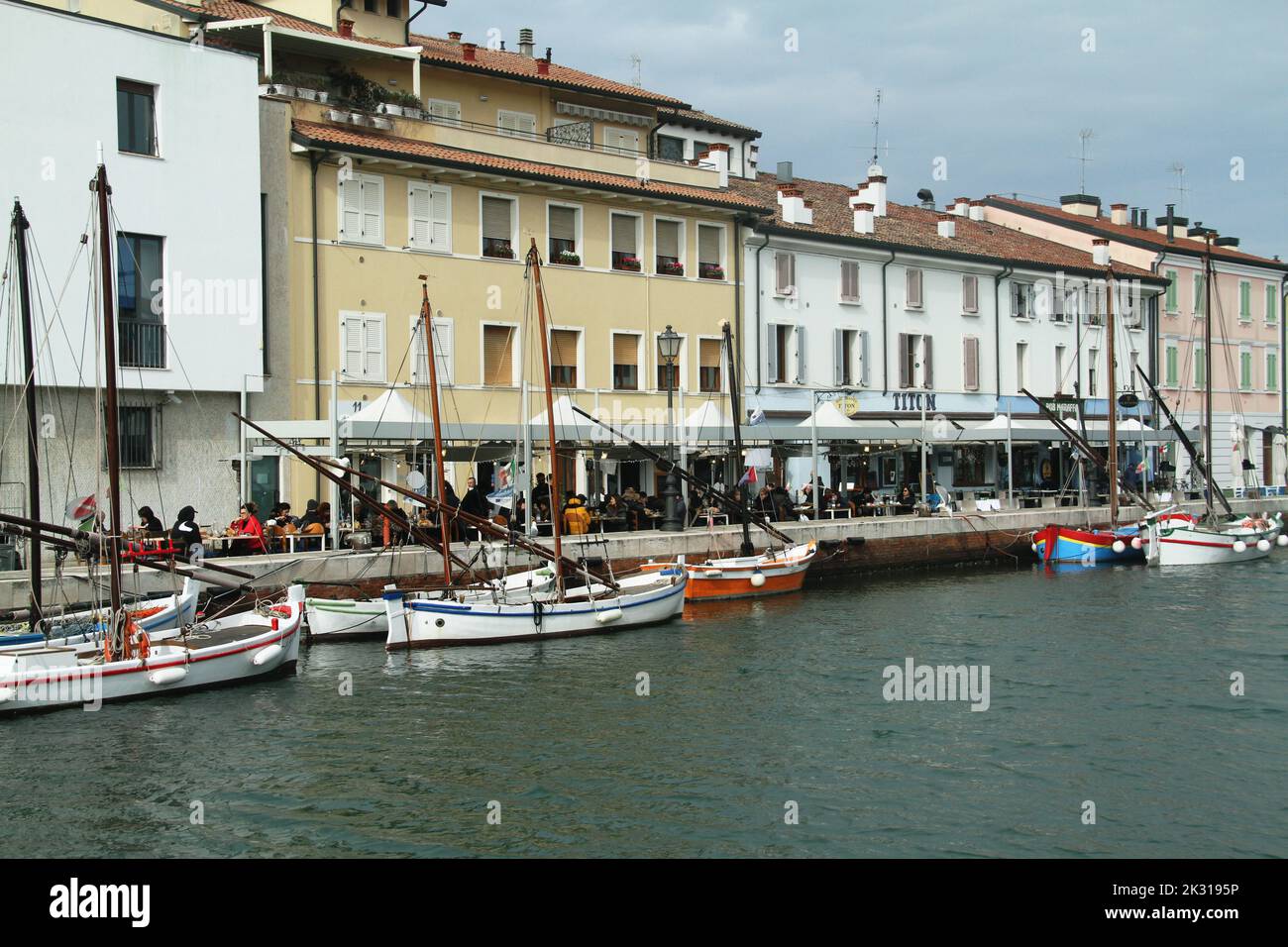 Cesenatico, Italy. Fishing boats docked on the canal and an animated ...