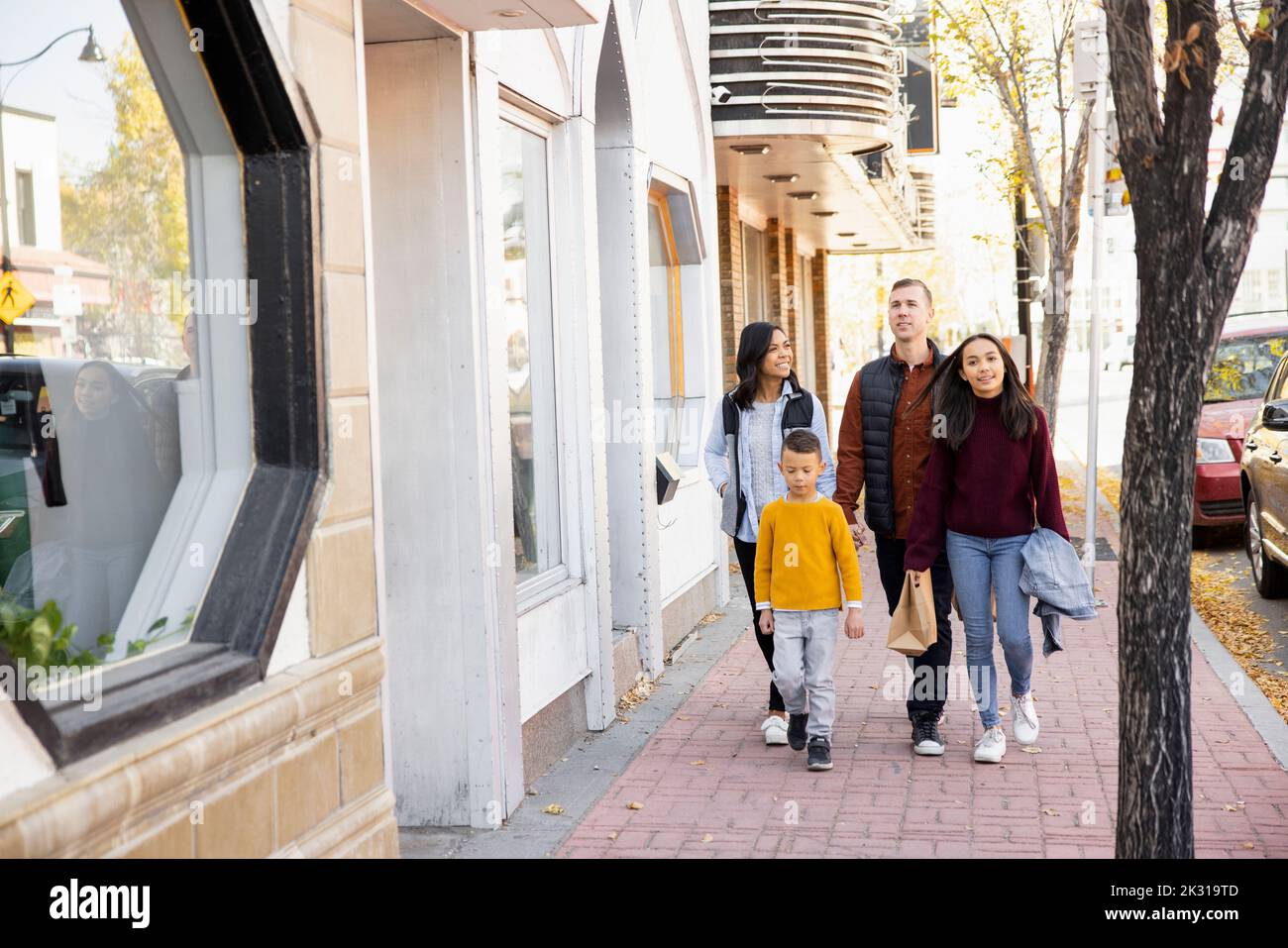 Family group walking together hi-res stock photography and images - Alamy