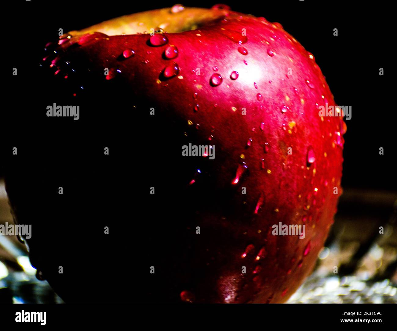 Red Apple covered in water droplets Stock Photo - Alamy