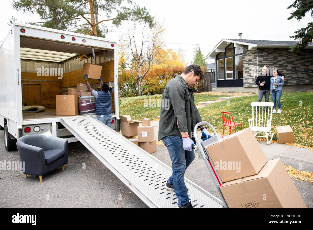 Couple and outside new house hi-res stock photography and images - Alamy