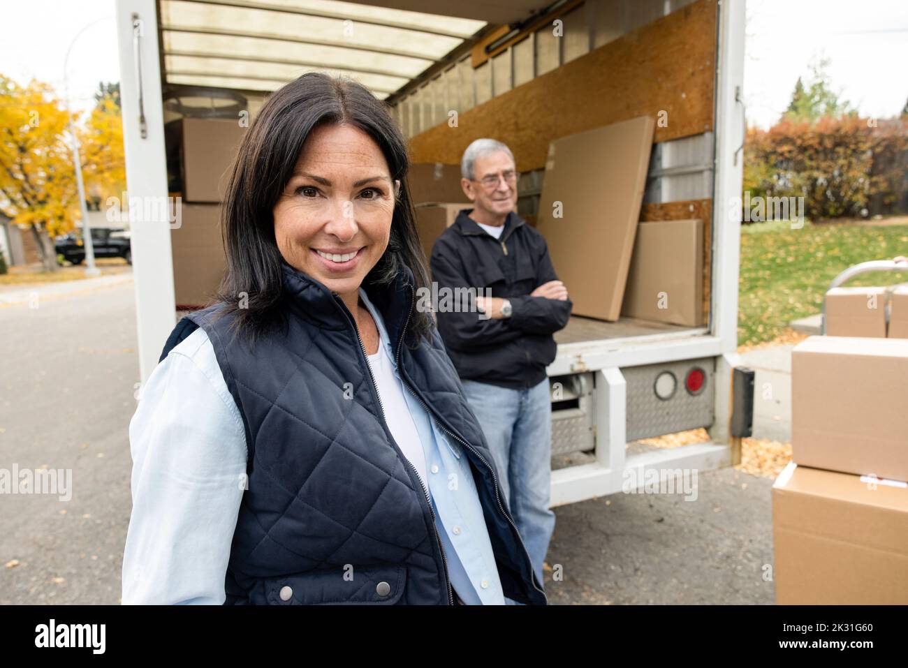Senior woman moving home hi-res stock photography and images - Alamy