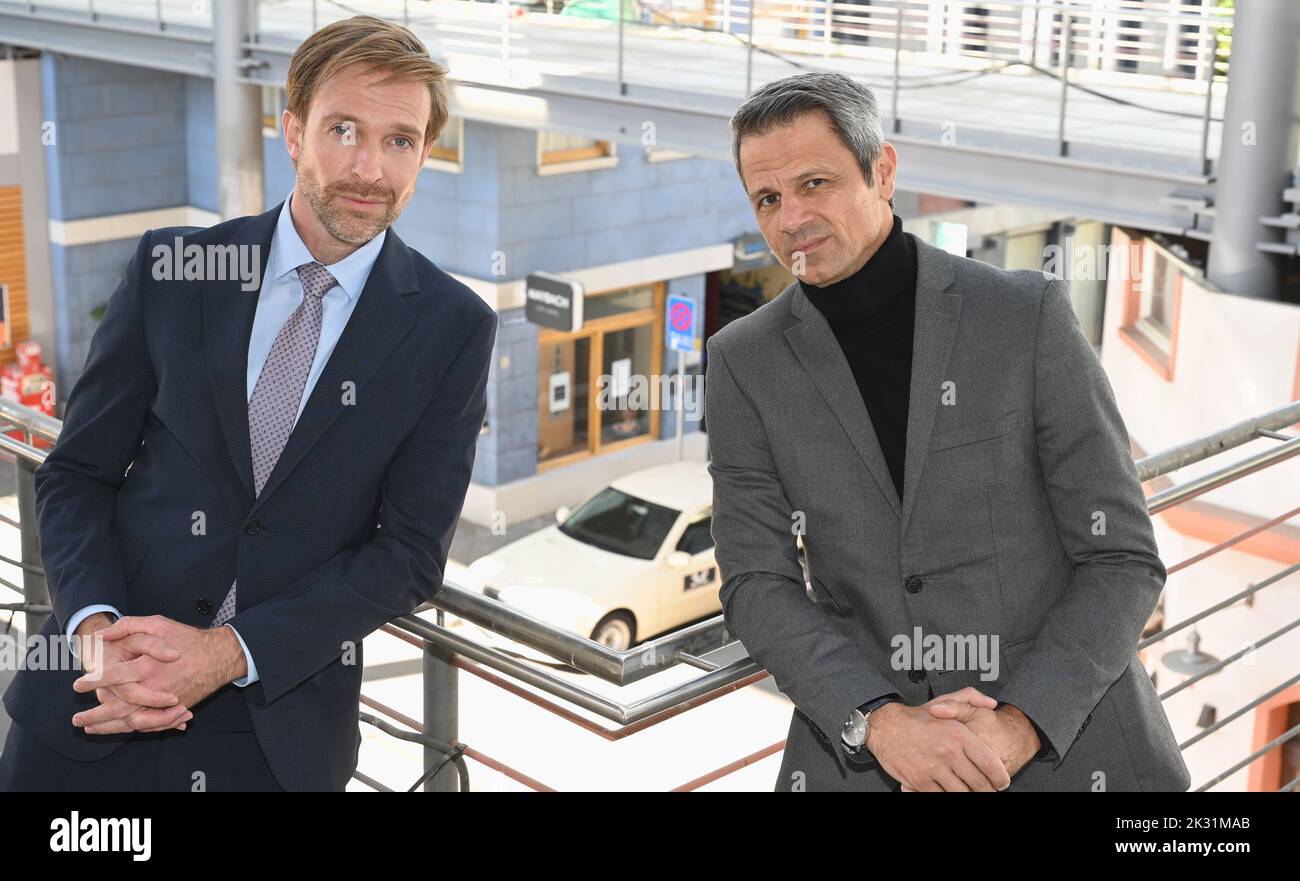 Cologne, Germany. 22nd Sep, 2022. Actors Jens Hajek (r) and Hugo Grimm have their picture taken ...