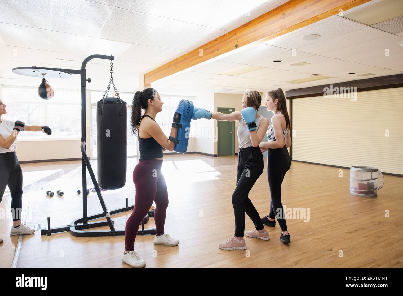 Teen girls standing in gym hi-res stock photography and images - Alamy