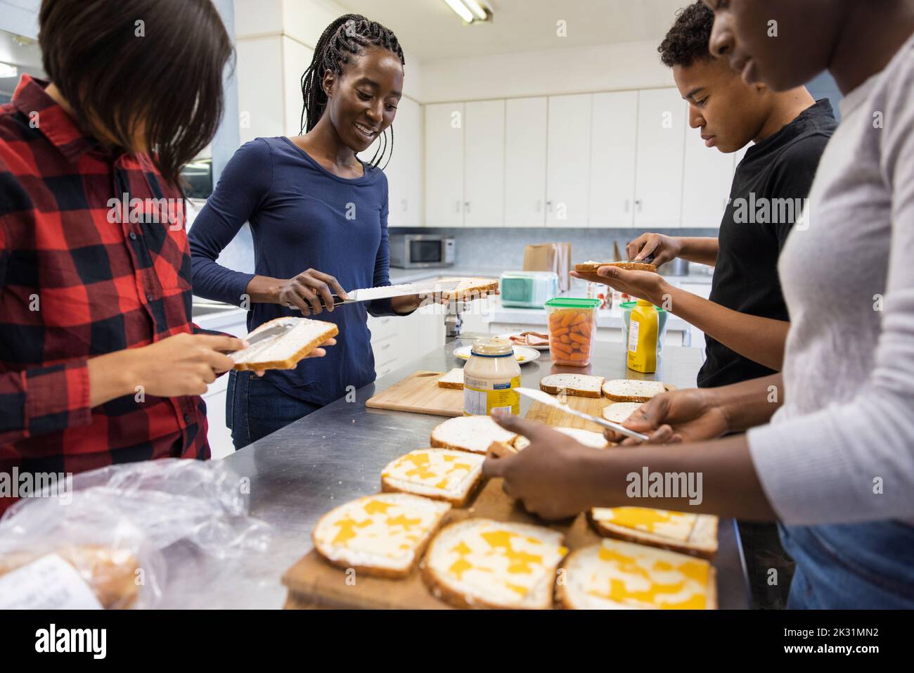 Teenager making sandwich boy hi-res stock photography and images - Alamy