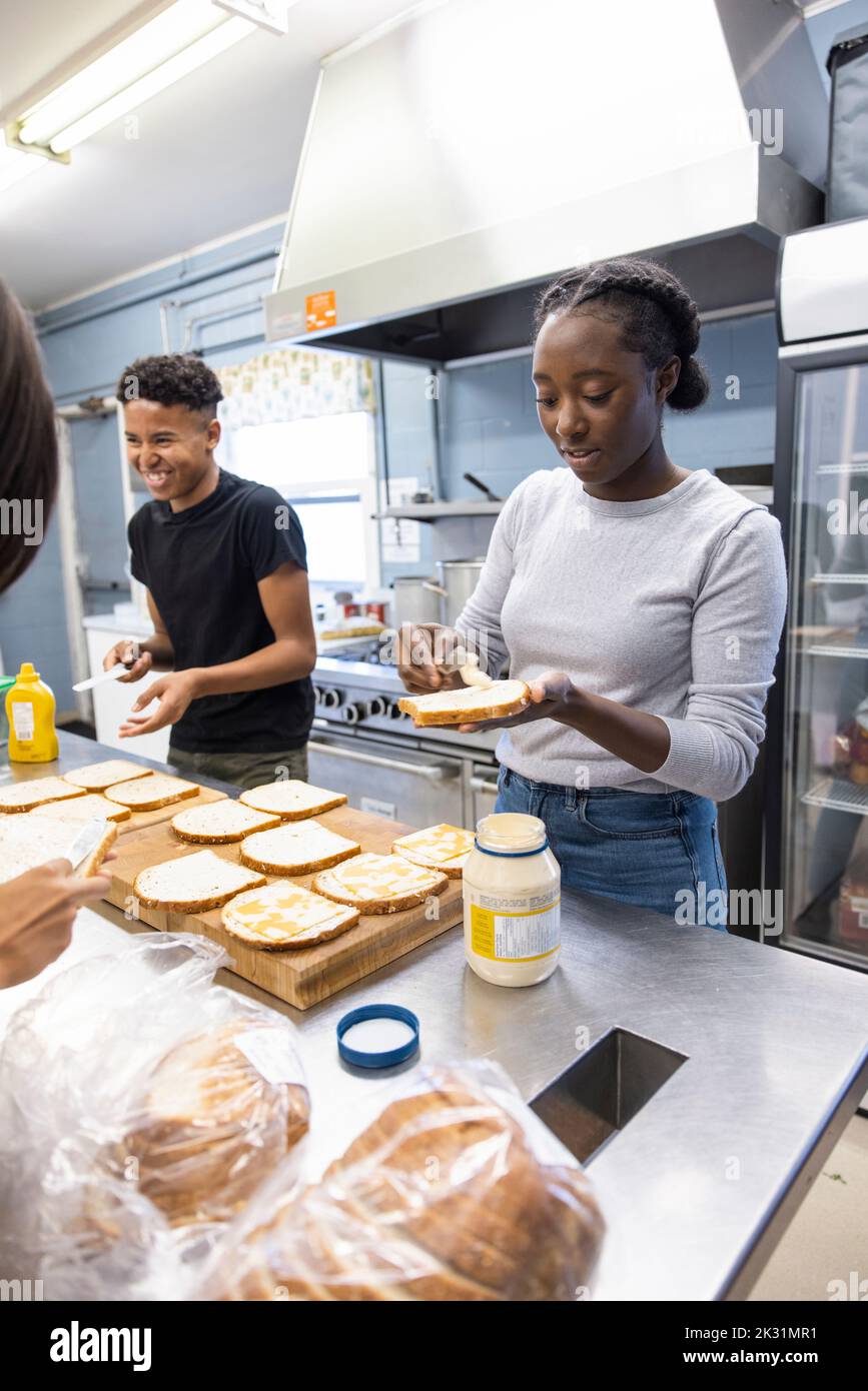 Teenager making sandwich boy hi-res stock photography and images - Alamy