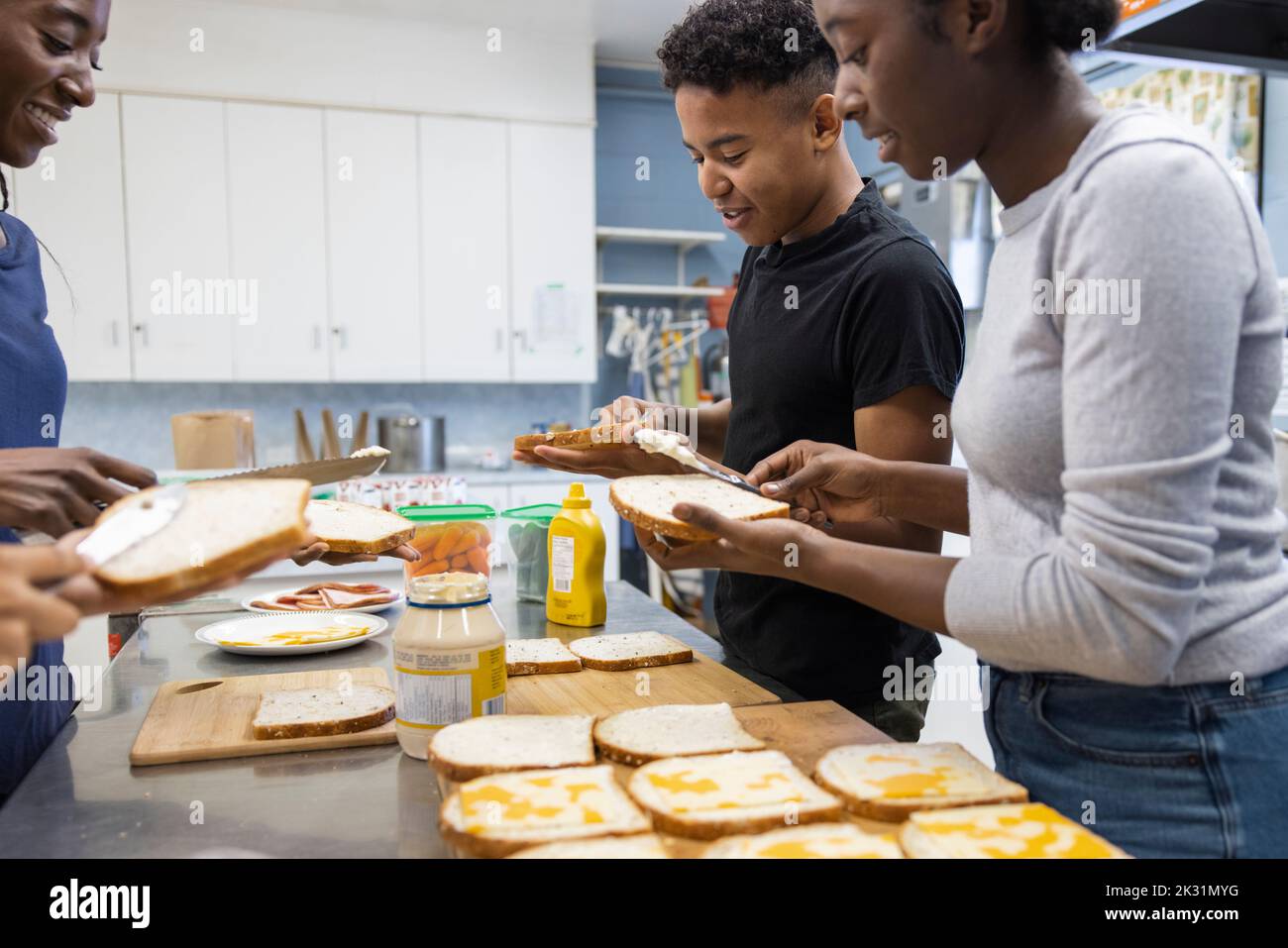 Teenager making sandwich boy hi-res stock photography and images - Alamy