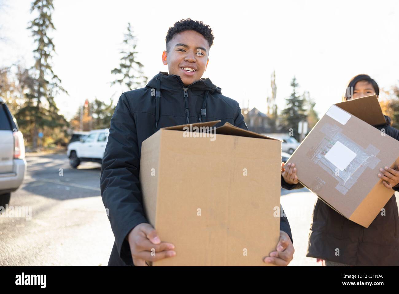 Black teenage boy happy hi-res stock photography and images - Alamy