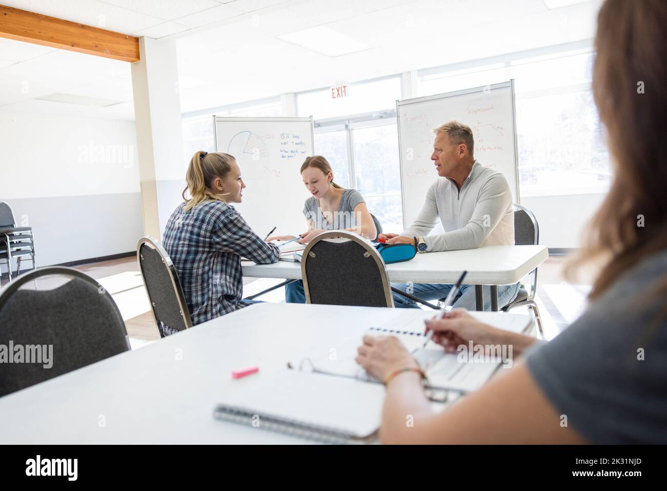 Child teen helping homework hi-res stock photography and images - Alamy