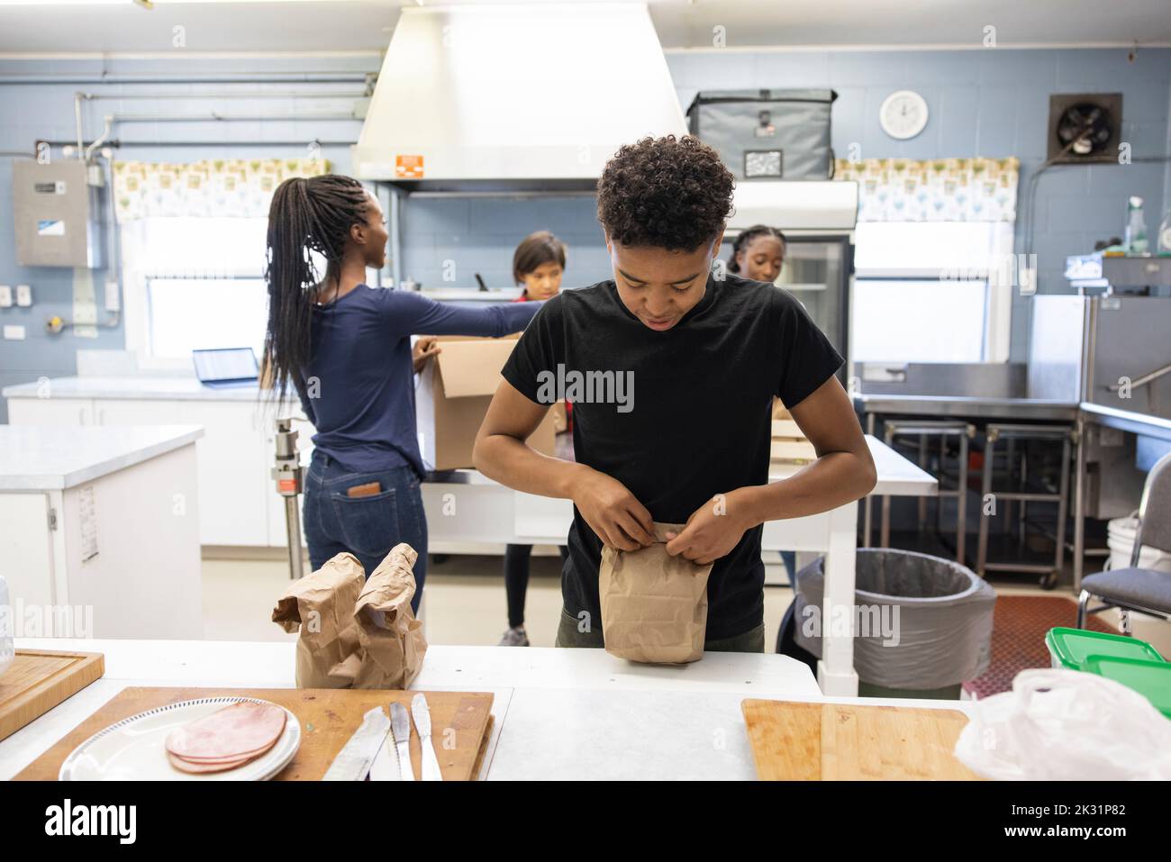 Boy girl school lunch hi-res stock photography and images - Alamy