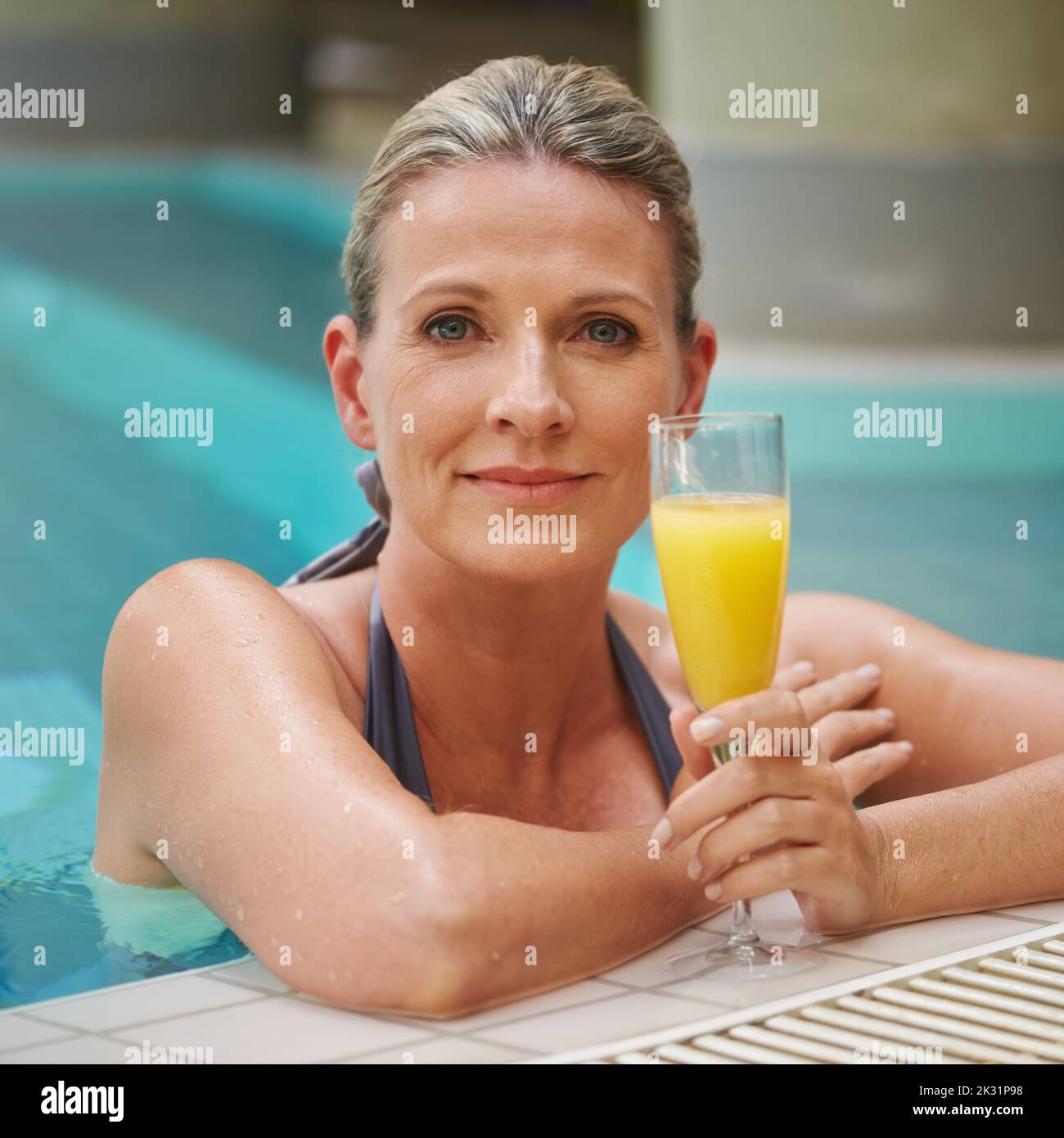 Enjoying a day of luxury and leisure. Portrait of a mature woman ...