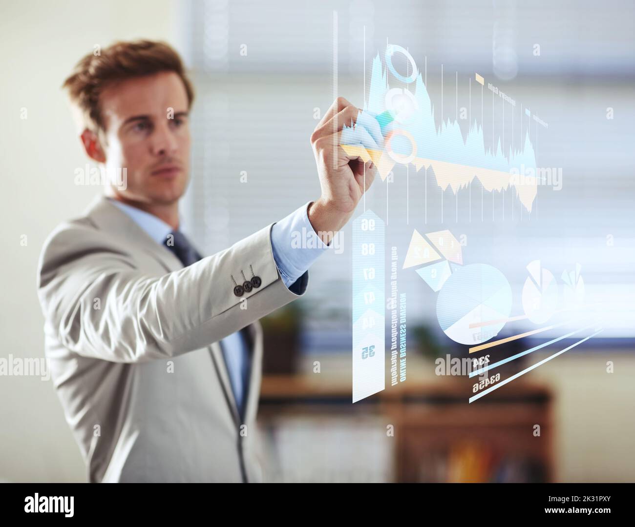 Predicting the future of modern business. a handsome young businessman ...