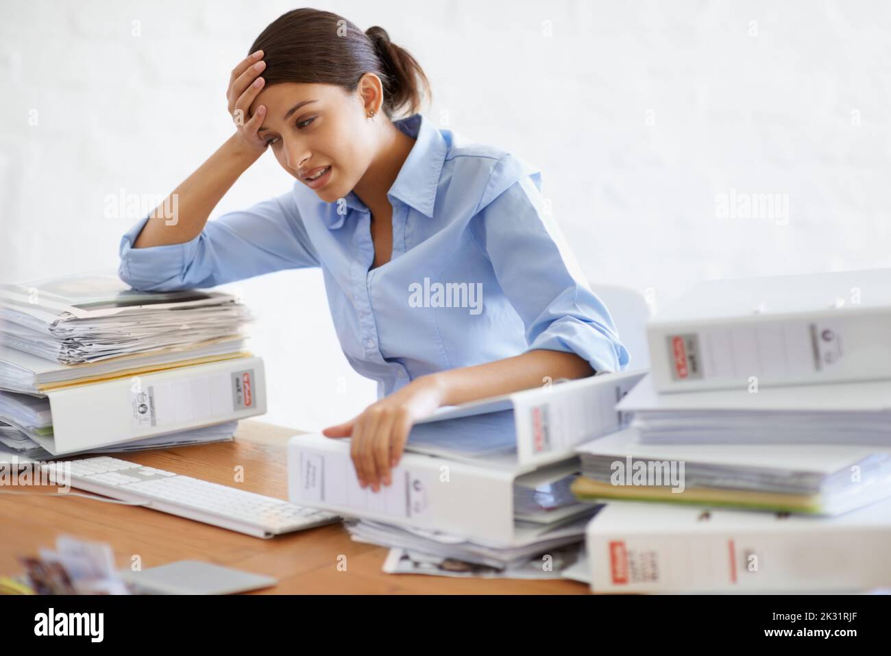 Surrounded by paperwork hi-res stock photography and images - Alamy