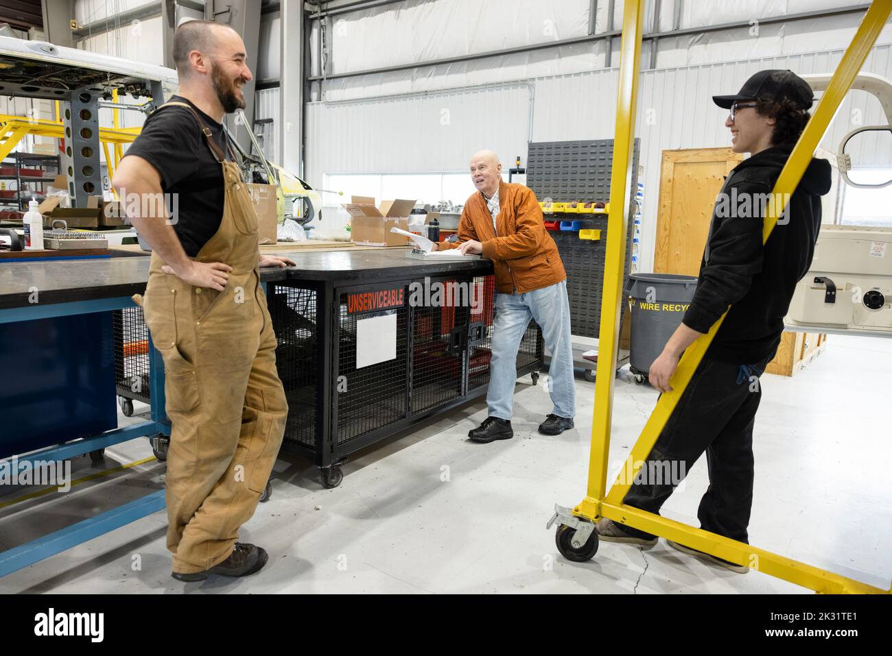 Three people chatting hi-res stock photography and images - Alamy